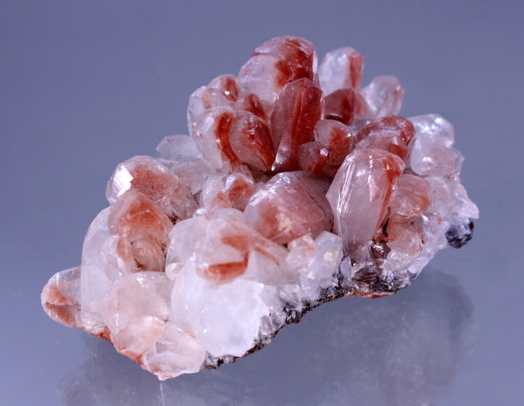 Calcite on Hematite - GeoKrazy Minerals