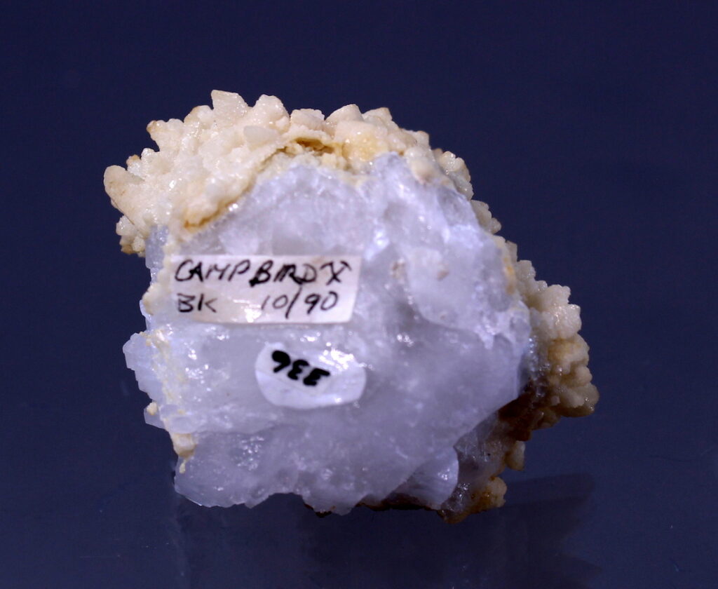 Calcite on Quartz - GeoKrazy Minerals